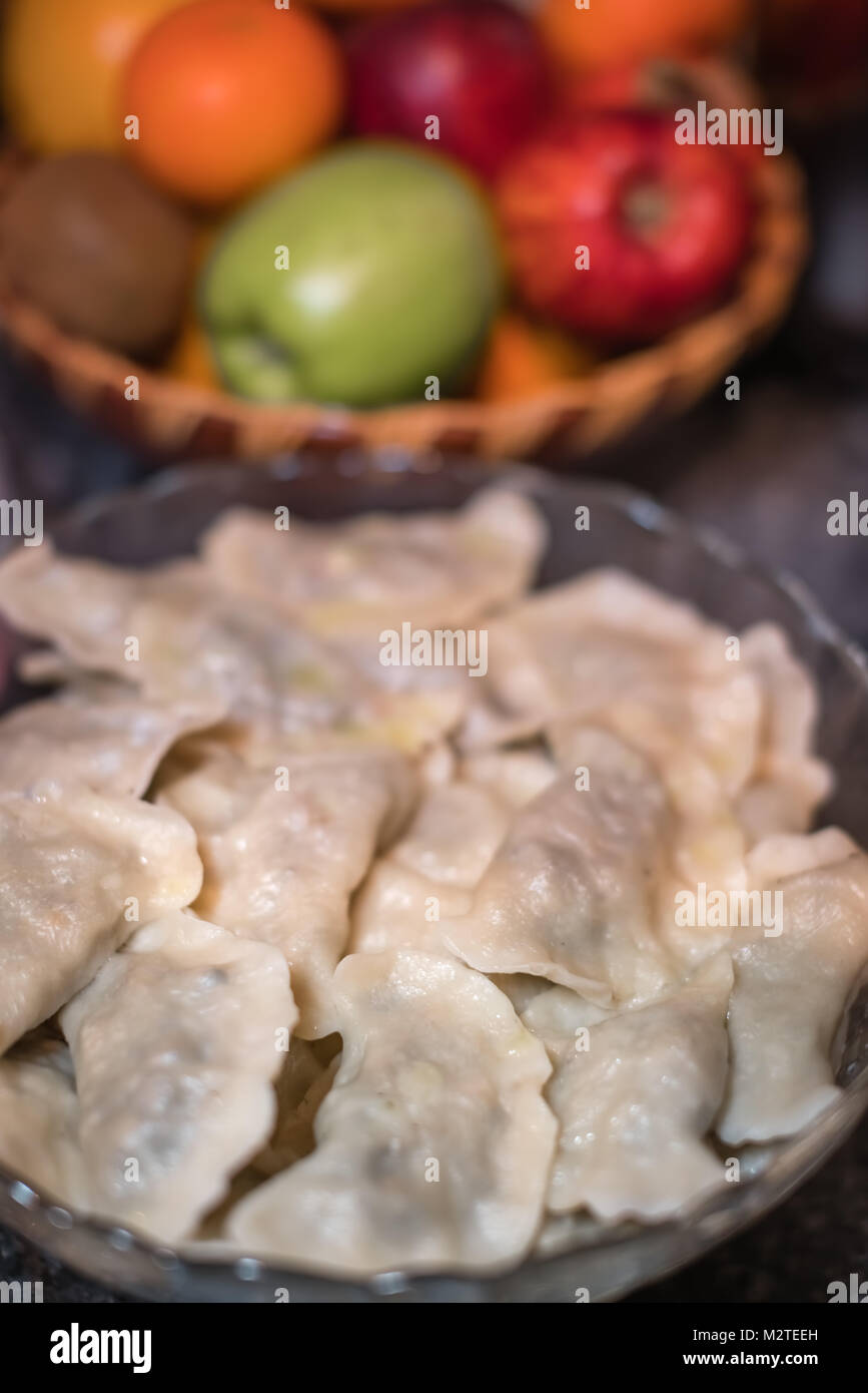 Traditonal Polish food called pierogi in a glass bowl ready to be ...