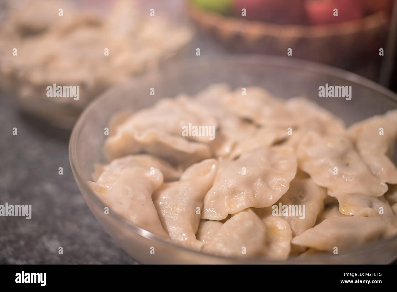 Traditonal Polish food called pierogi in a glass bowl ready to be ...
