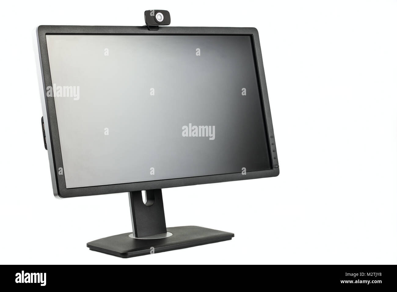 Digital black computer monitor screen and HD web camera on white ...