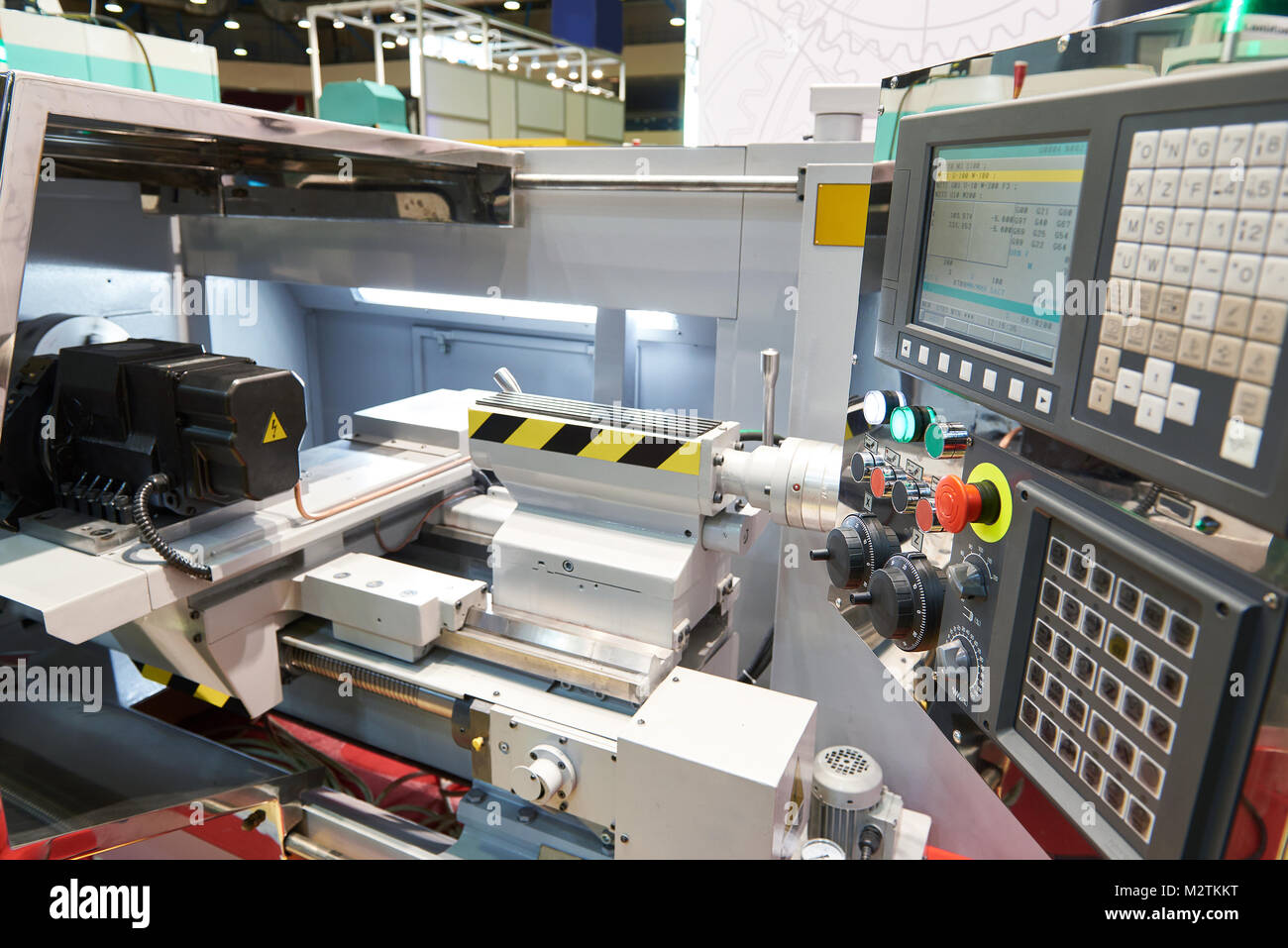 CNC lathe with cutters and workpiece Stock Photo - Alamy