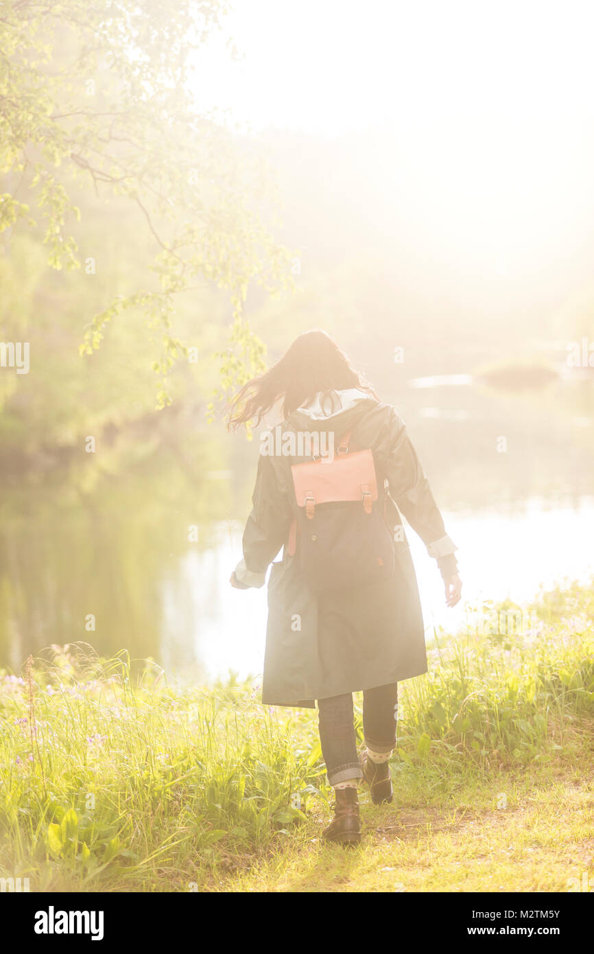 Woman walking in field hi-res stock photography and images - Alamy