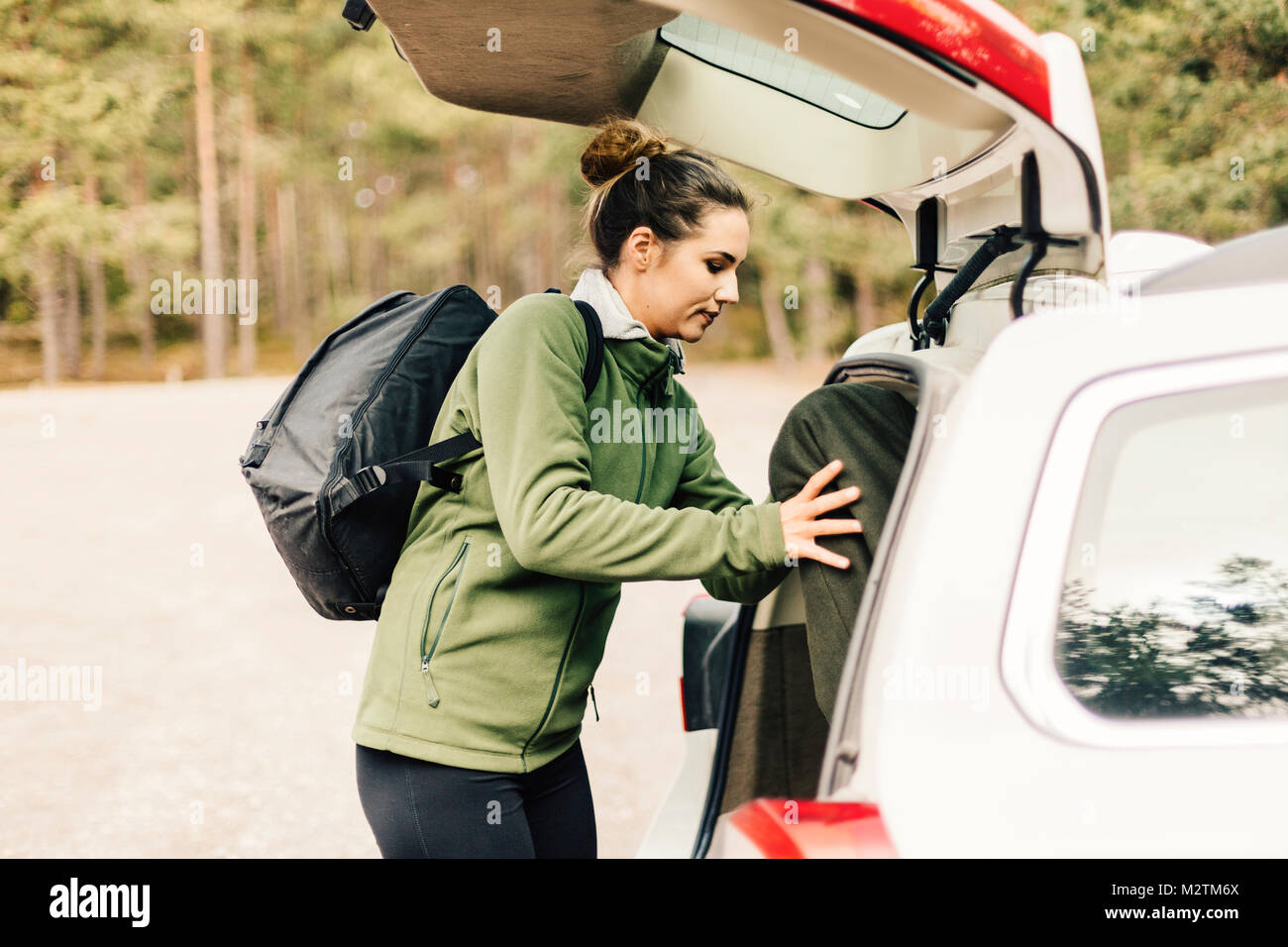 Car side view people bags hi-res stock photography and images - Alamy