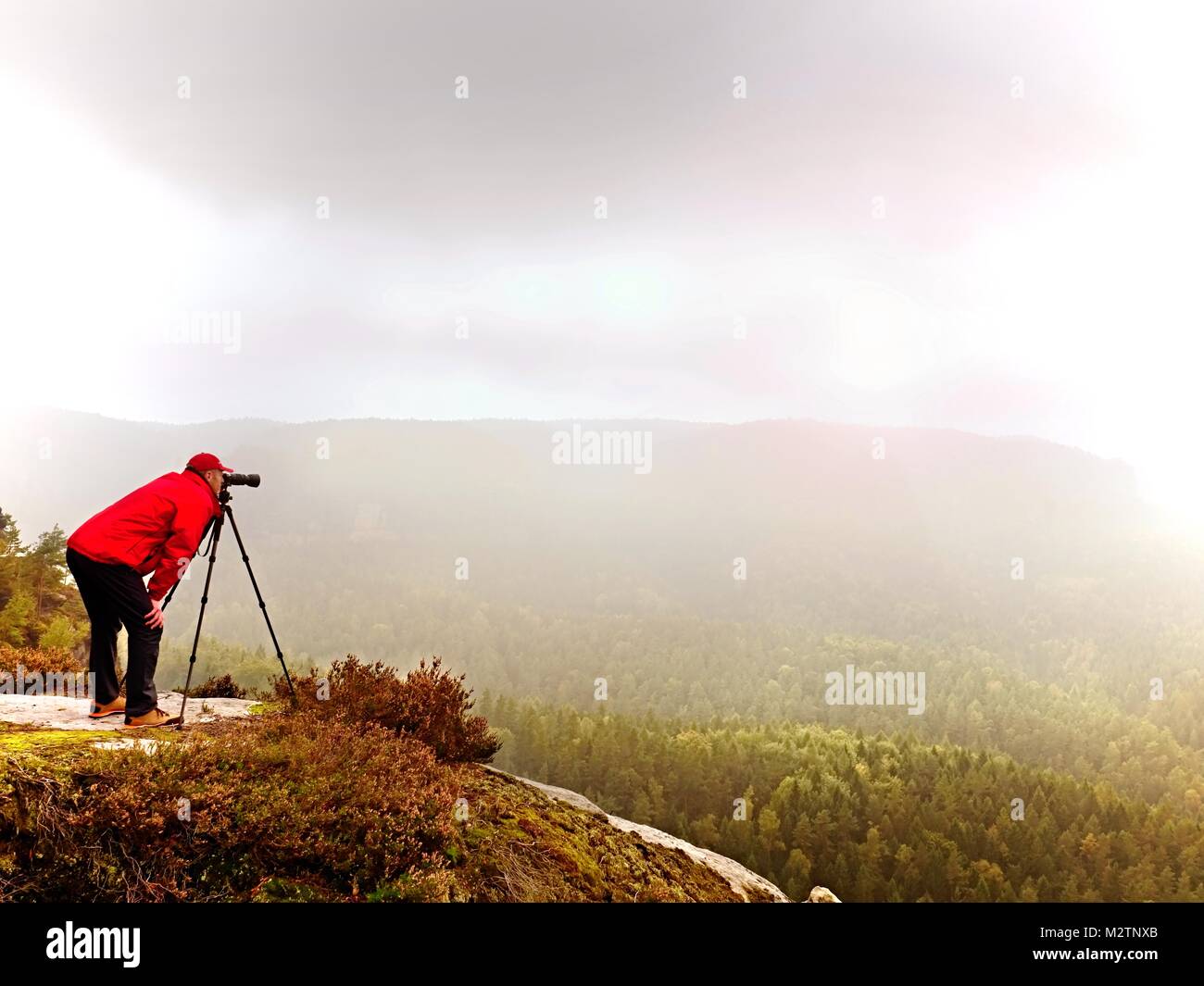 Nature photographer works alone in hi-res stock photography and images ...