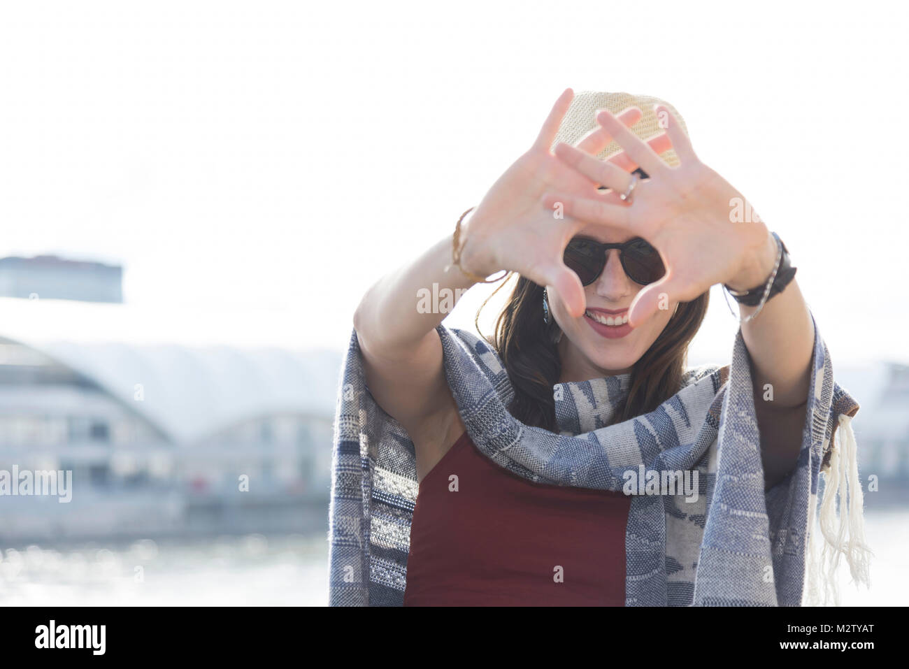 Woman smile hands face hi-res stock photography and images - Alamy