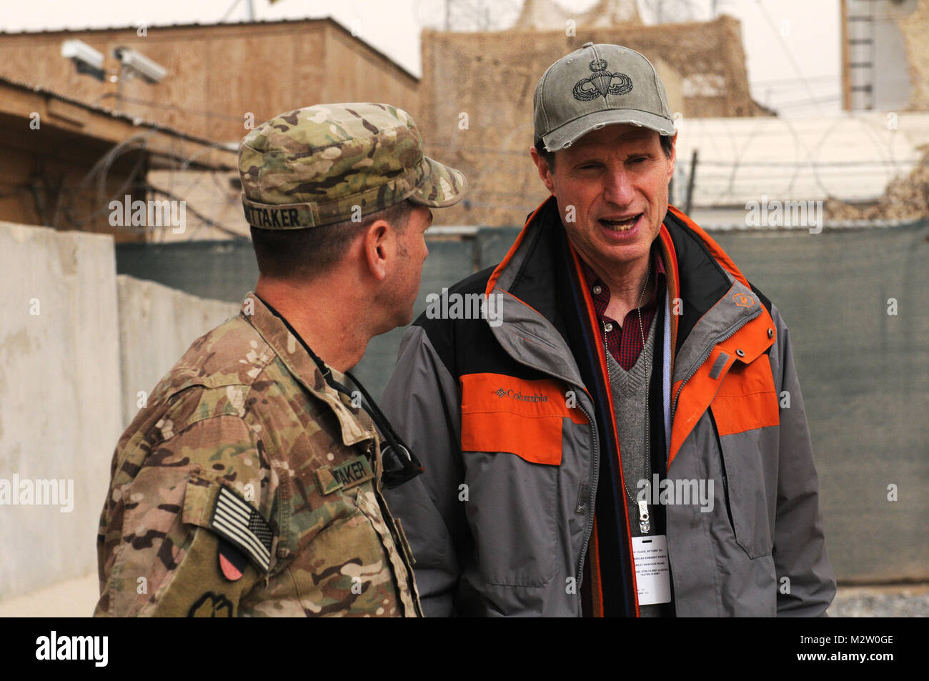 Senator Ron Wyden (D-OR) speaks with 1st Sgt. Douglas W. Whittaker ...