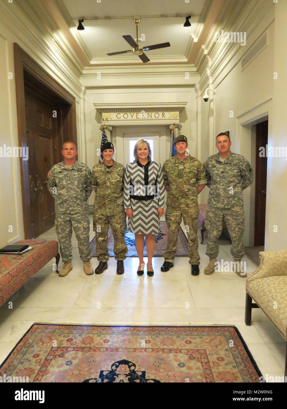(L-R) 1st Lt. George Goss, Lt. Francesca Pinel, Governor Mary Fallin ...