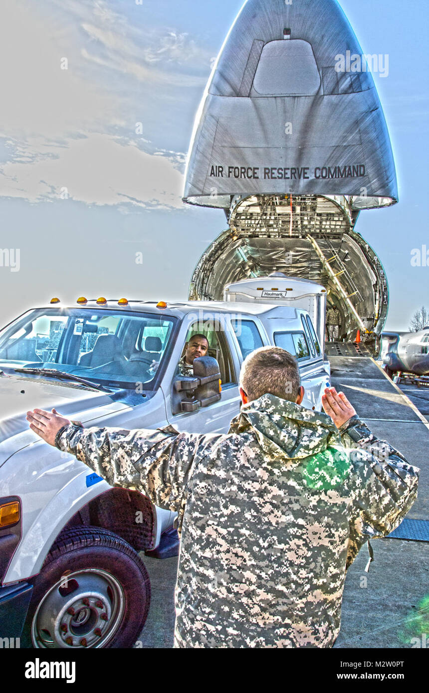 Defense Coordination Element practices loading and unloading equipment ...