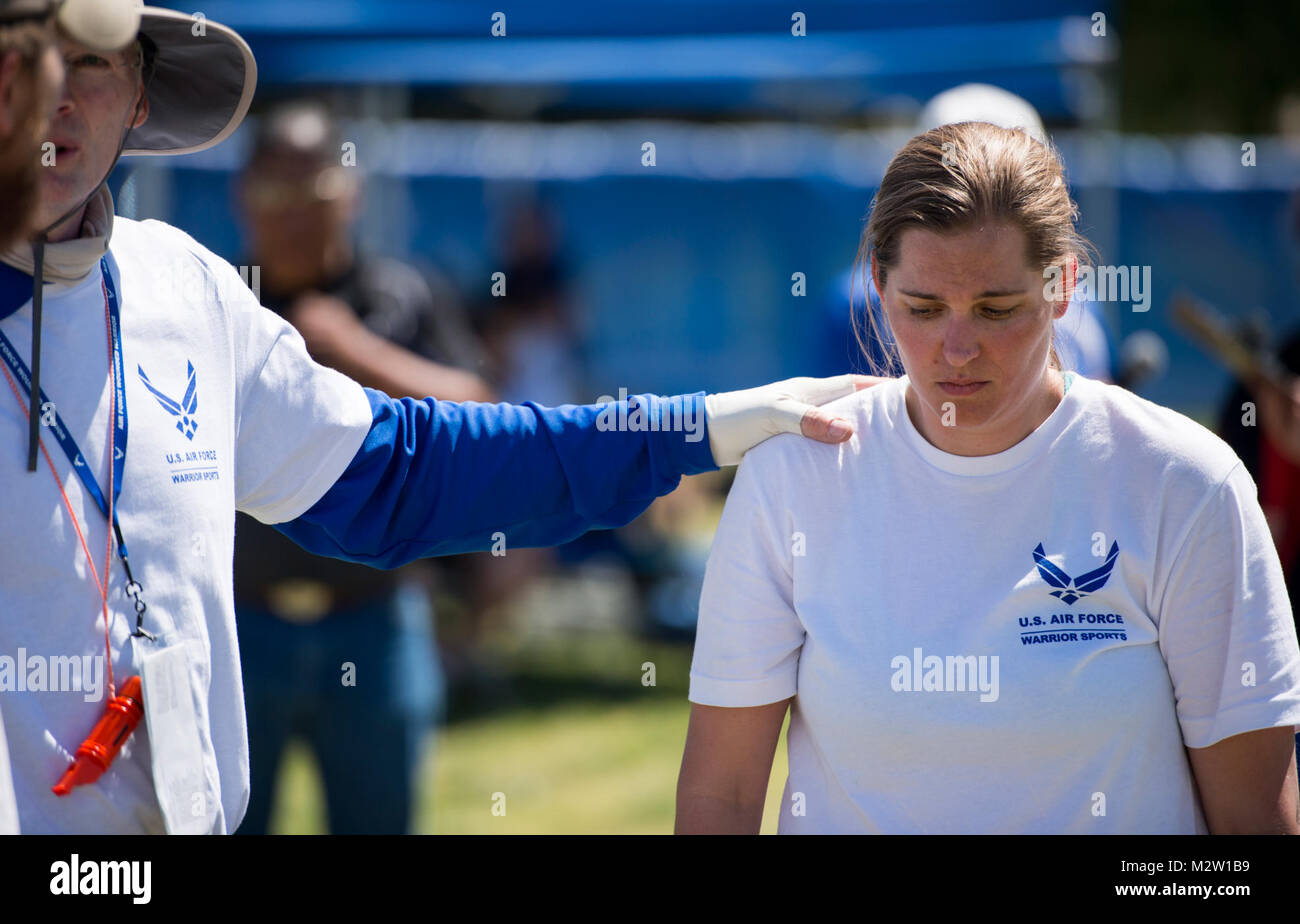 Kyle Burnett reacts after she lost her match in archery April 10, 2014 ...