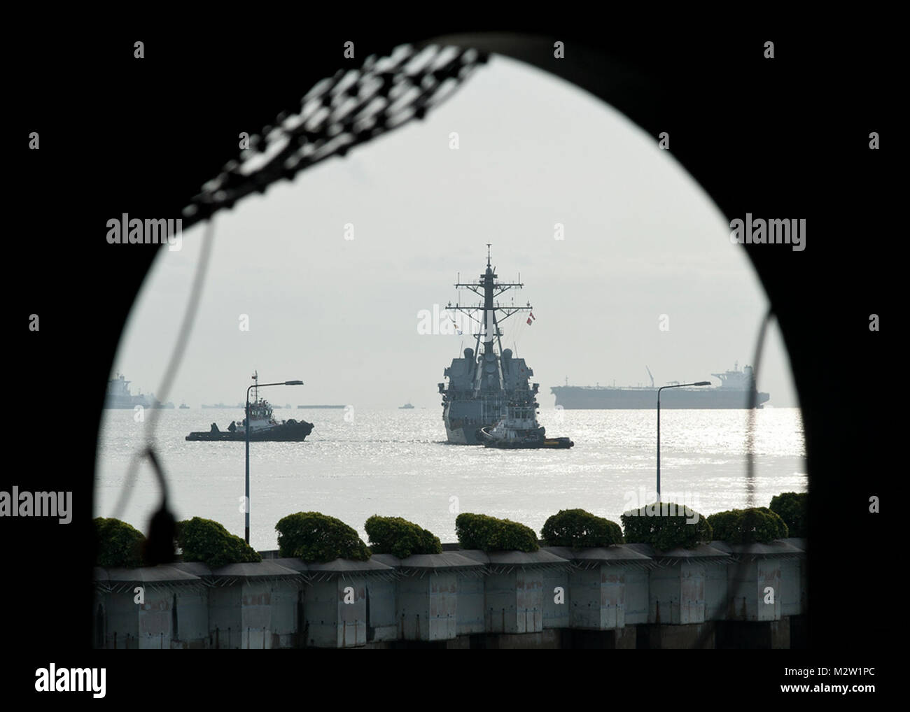 USS Pinckney departs Singapore shortly before aircraft carrier USS John ...