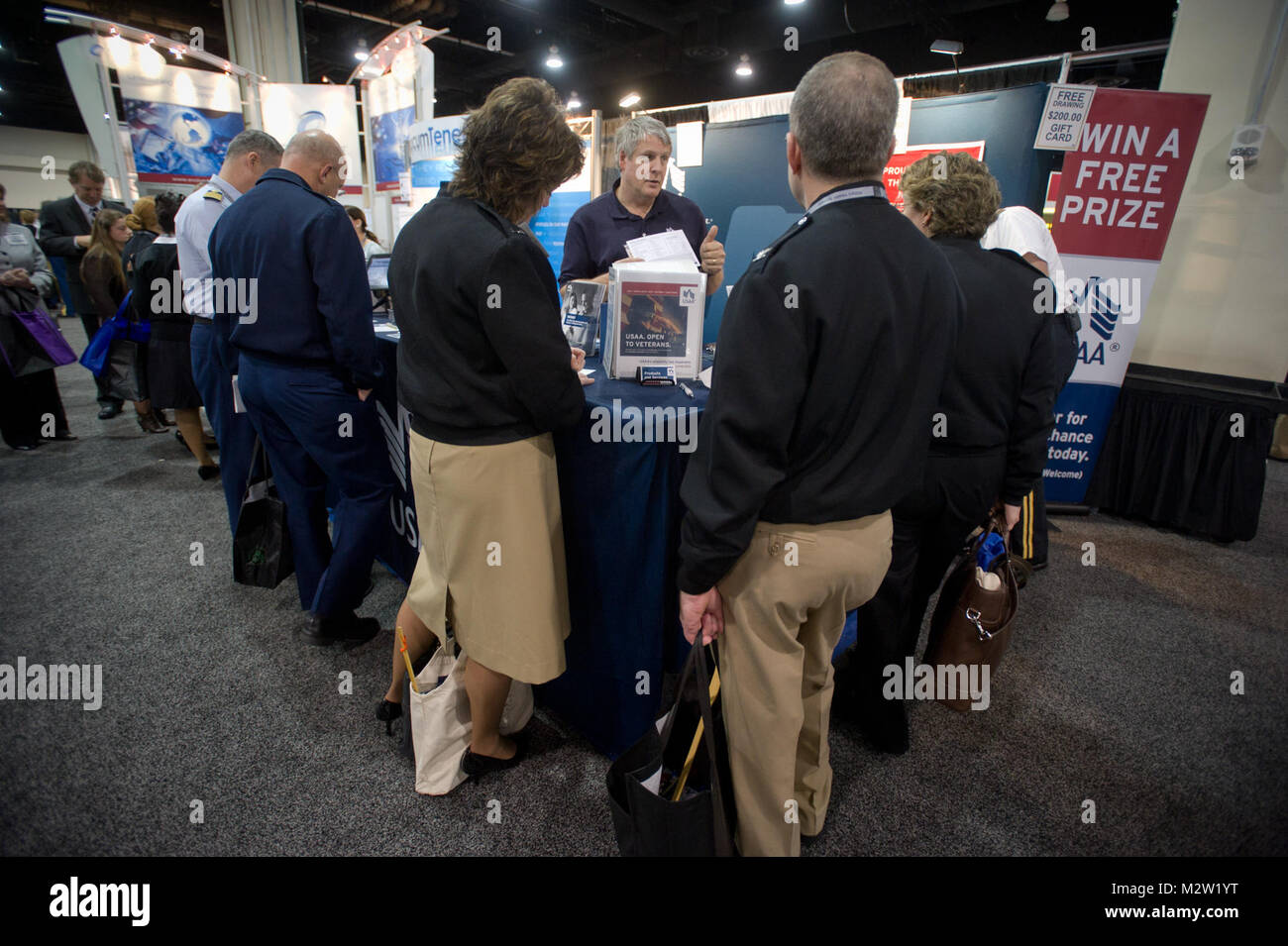 Conference attendees visit the Exhibit Hall the 2012 Military Health ...