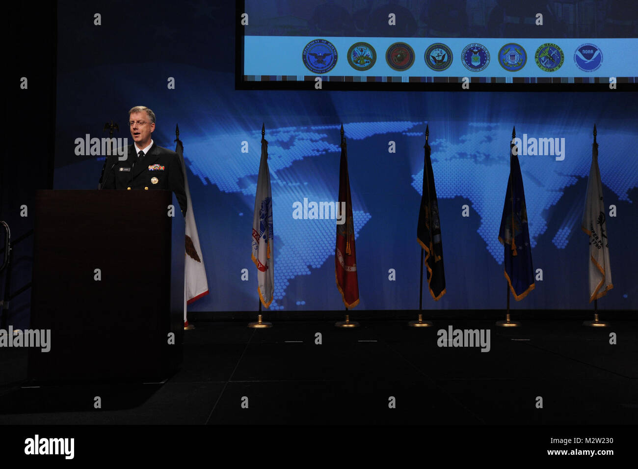 Capt. Tim Weber, chief of staff, TRICARE Management Activity, emcees ...
