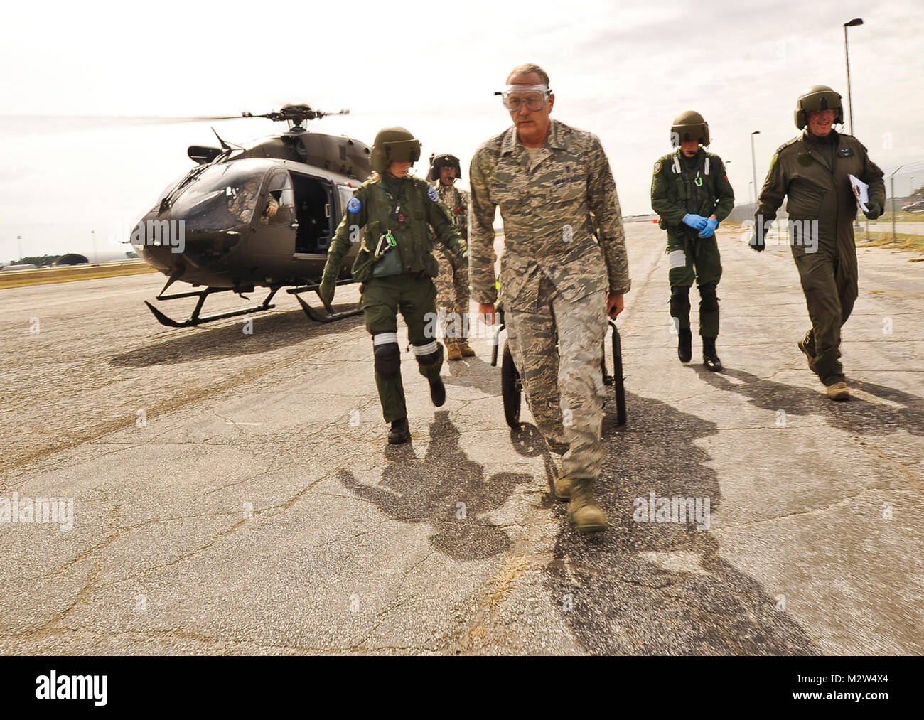 Air National Guard Master Sgt. Jerald Perman, center, 120th Medical ...