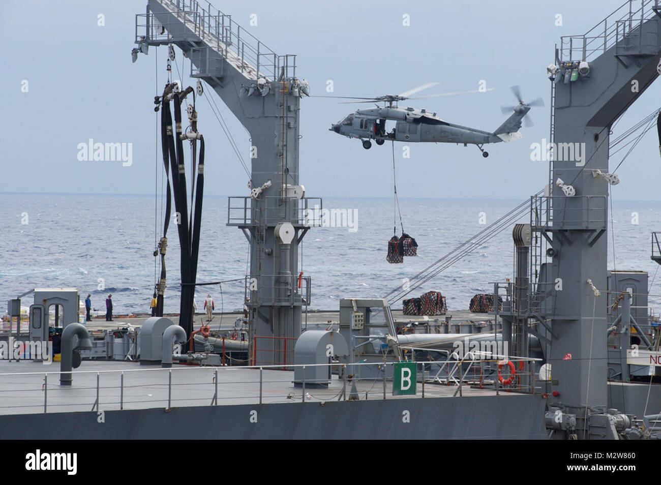 Vertical replenishment and underway refueling with USNS Walter S Diehl by #PACOM Stock Photo - Alamy