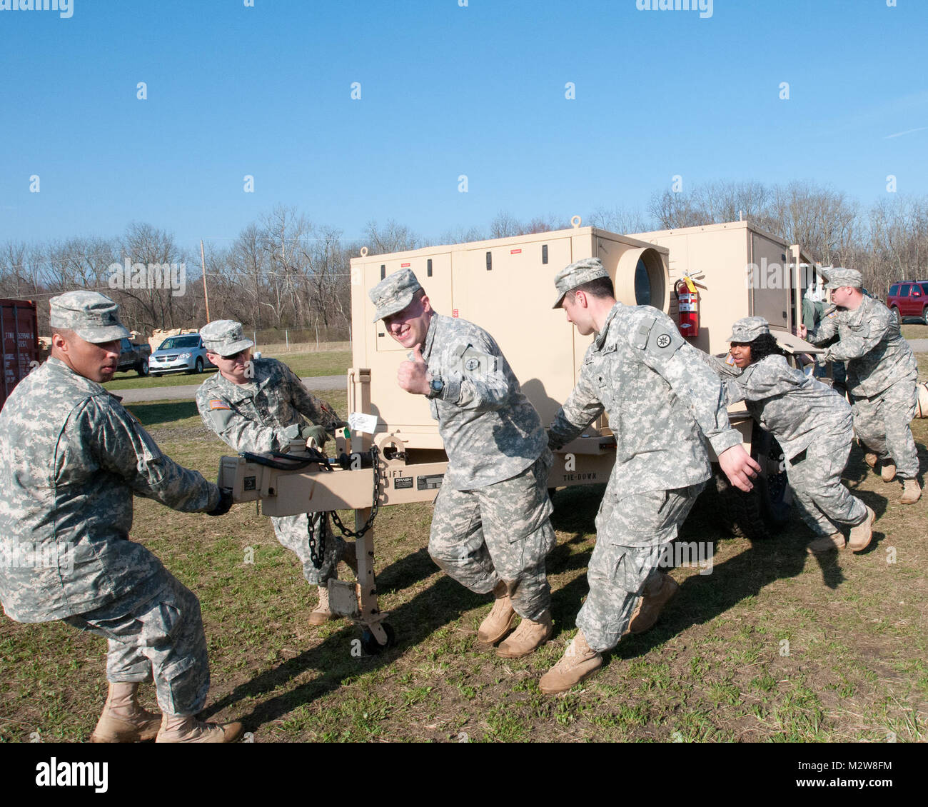 Soldiers of the 316th ESC move a medium Trailer Mounted Support System ...