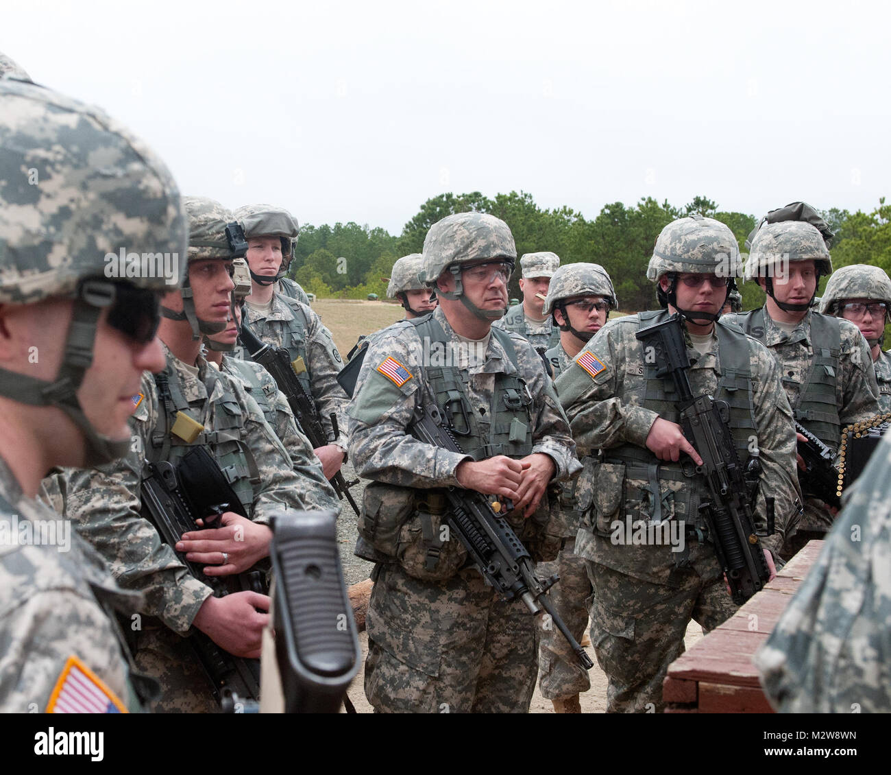 Soldiers of the 316th ESC receive a primary marksmanship instruction ...