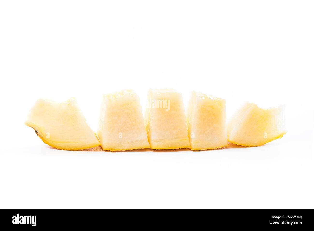 Sliced ripe juicy melon tropical fruit at summer time isolated on a ...