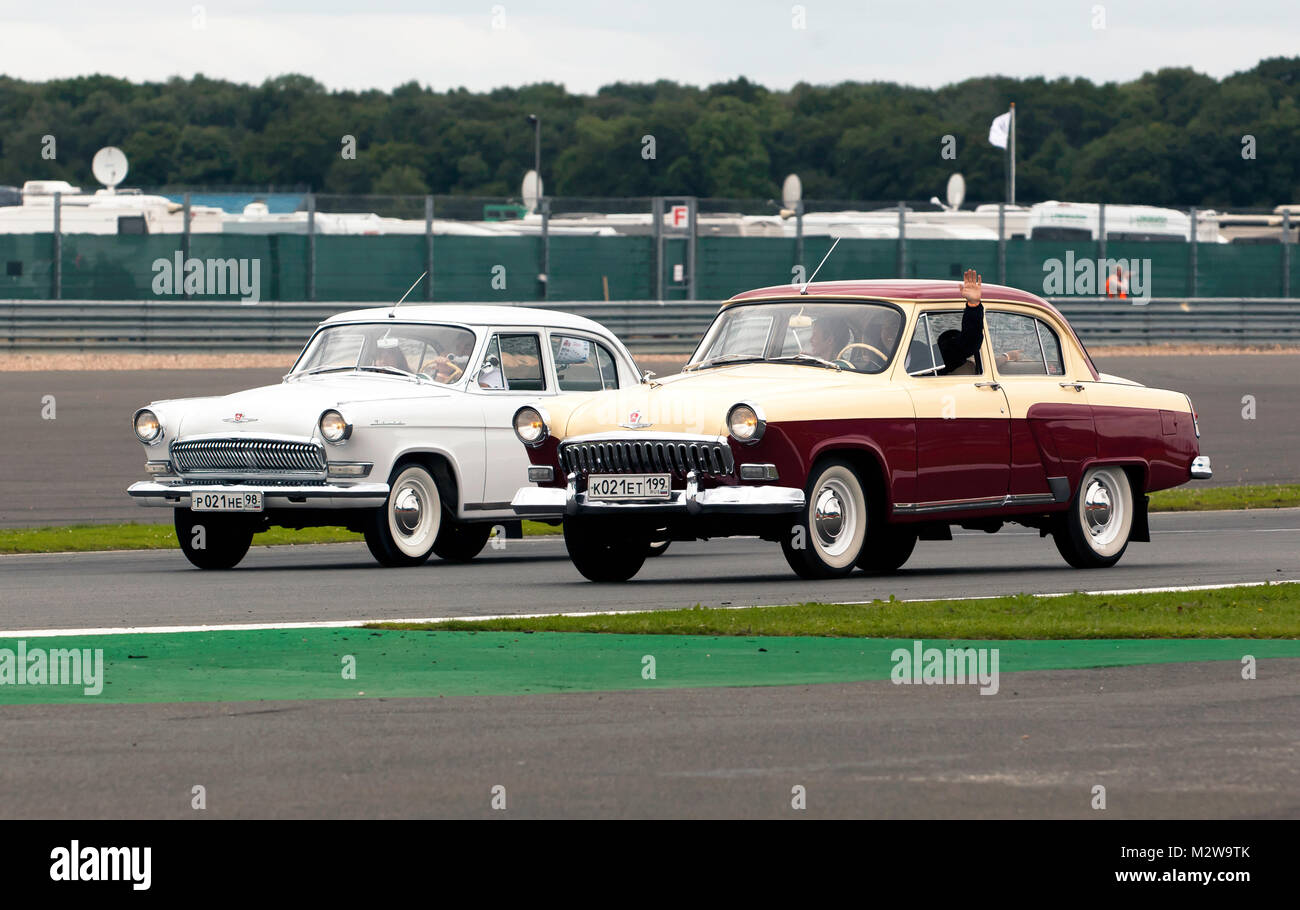 GAZ M21 Volga's parading around a historic race track during the 2017 ...