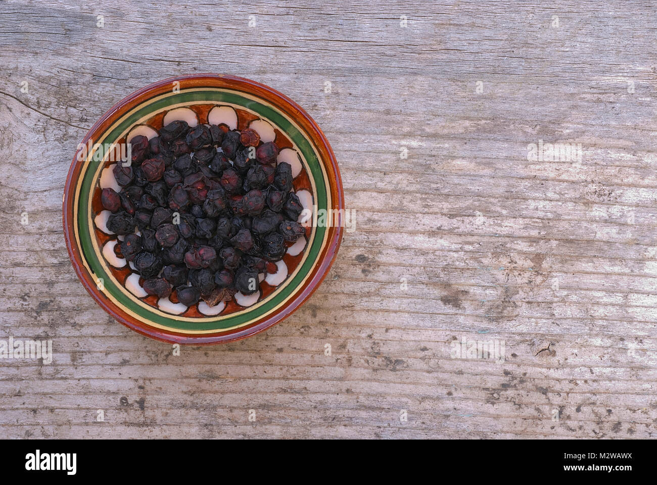Dried schisandra (Schisandra chinensis) edible fruit known as "five ...