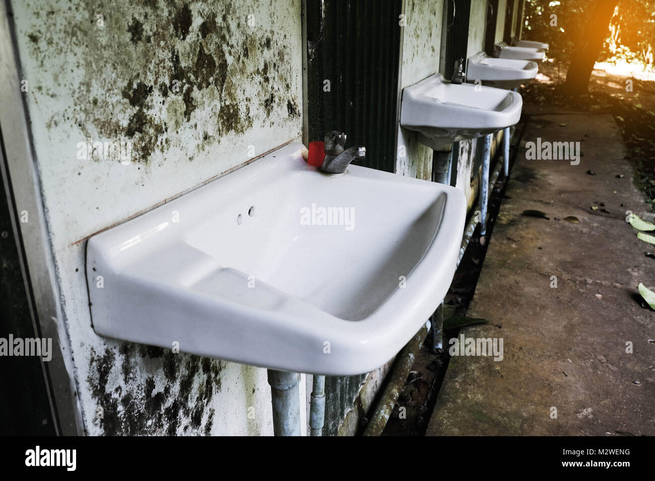 Dirty Clean wash basin in the bathroom Stock Photo - Alamy