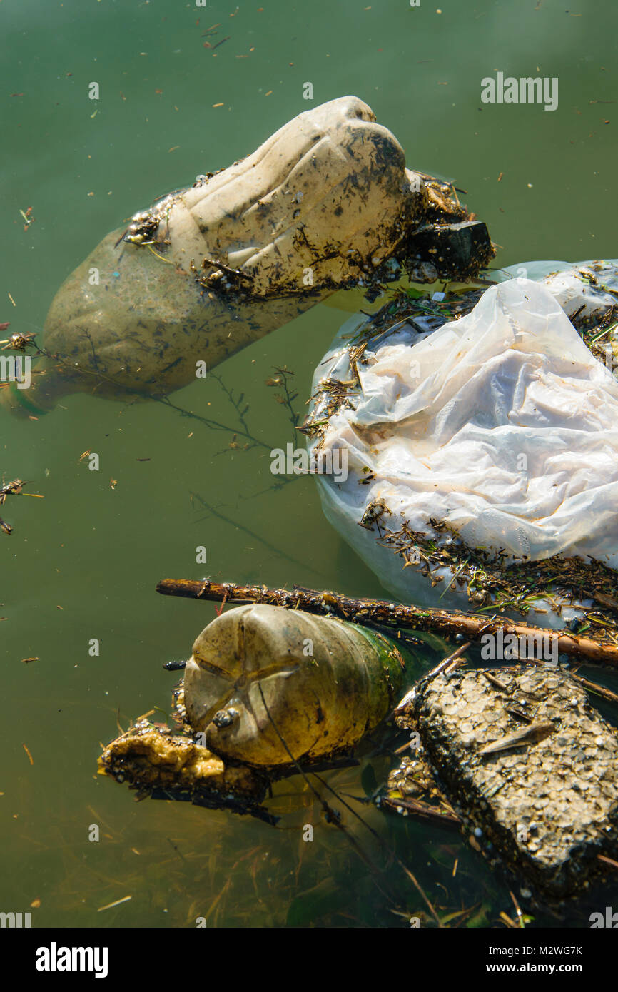 Plastic pollution in water. Ecological industry concept Stock Photo - Alamy