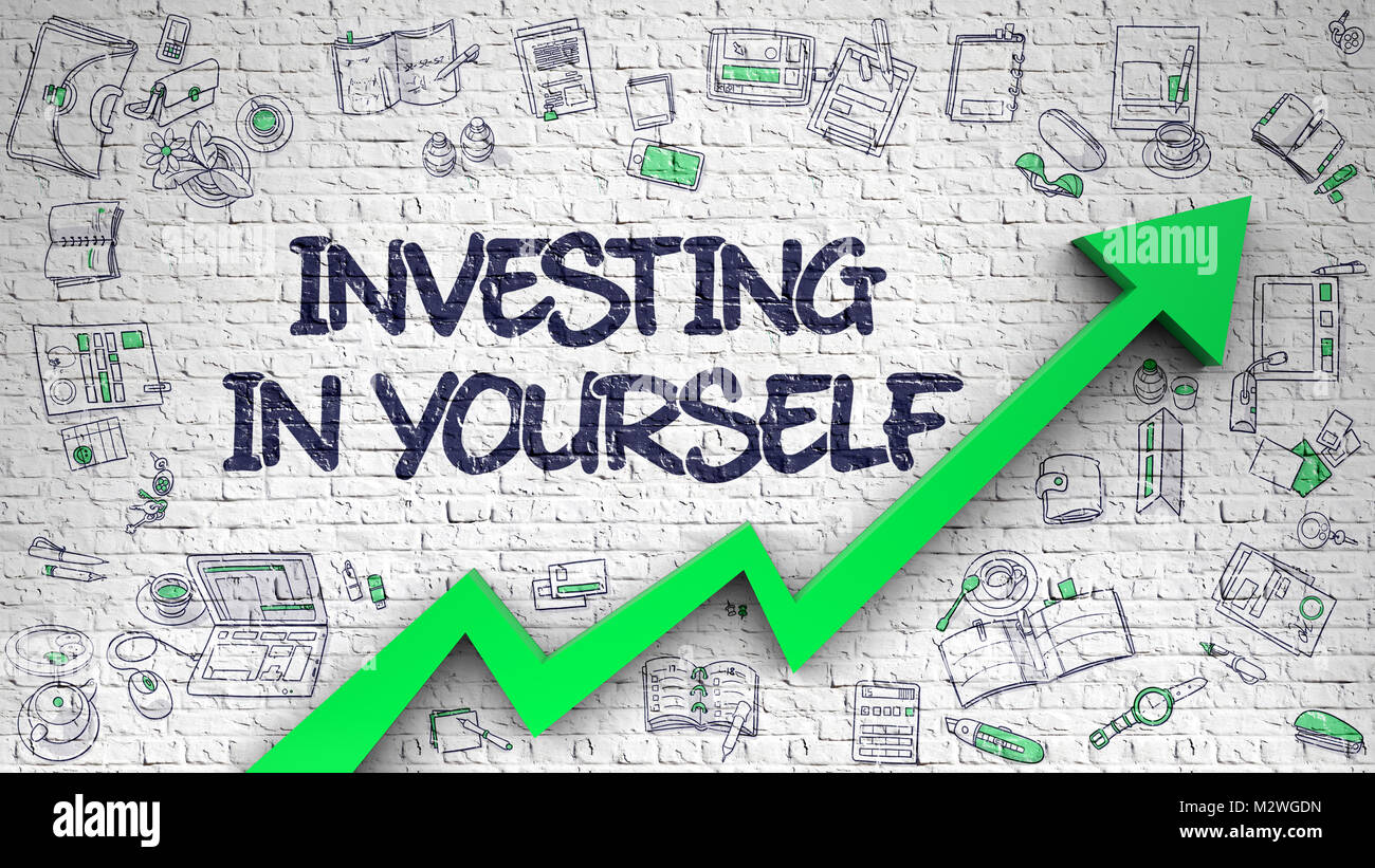 Investing In Yourself Drawn on White Brick Wall Stock Photo - Alamy