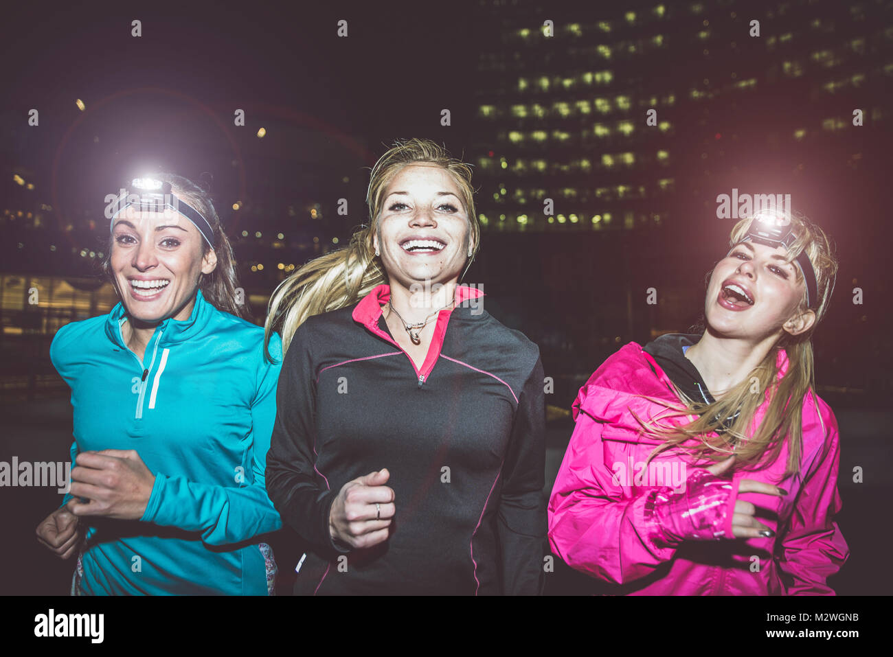 Multi Ethnic Female Athletes Running High Resolution Stock Photography ...