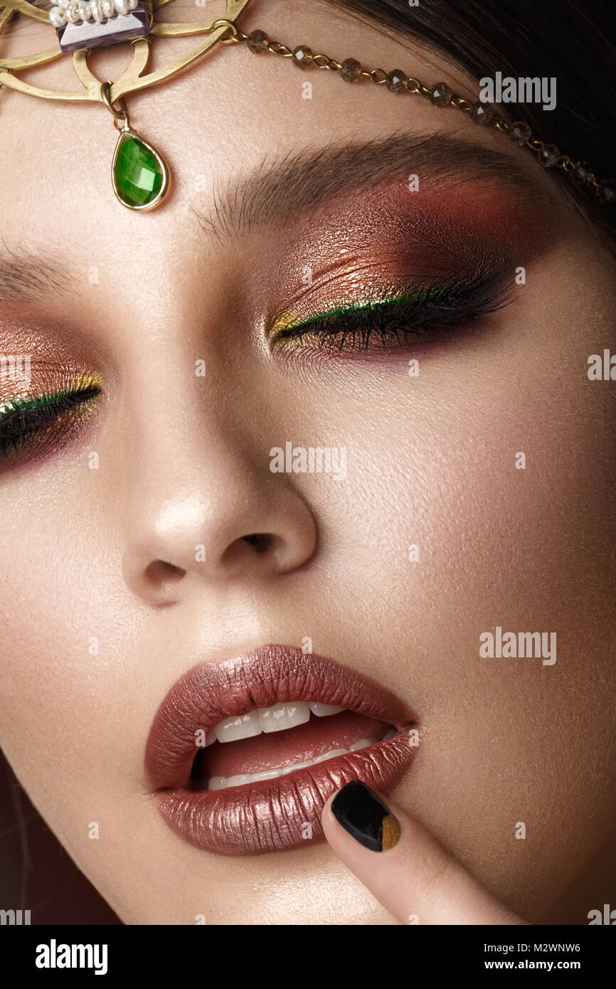 Beautiful girl with creative colorful makeup. Beauty face Stock Photo ...