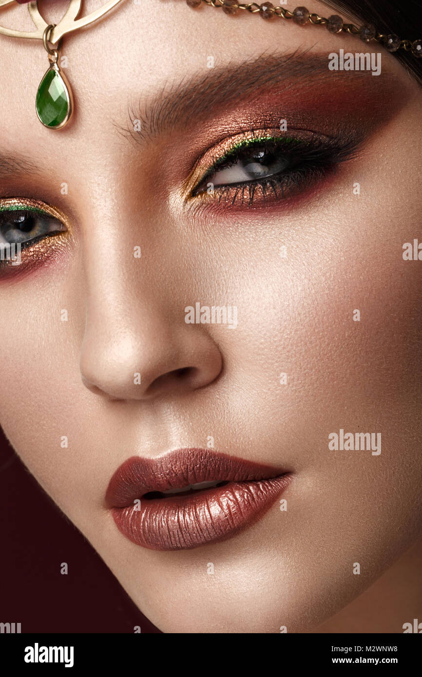 Beautiful girl with creative colorful makeup. Beauty face Stock Photo ...