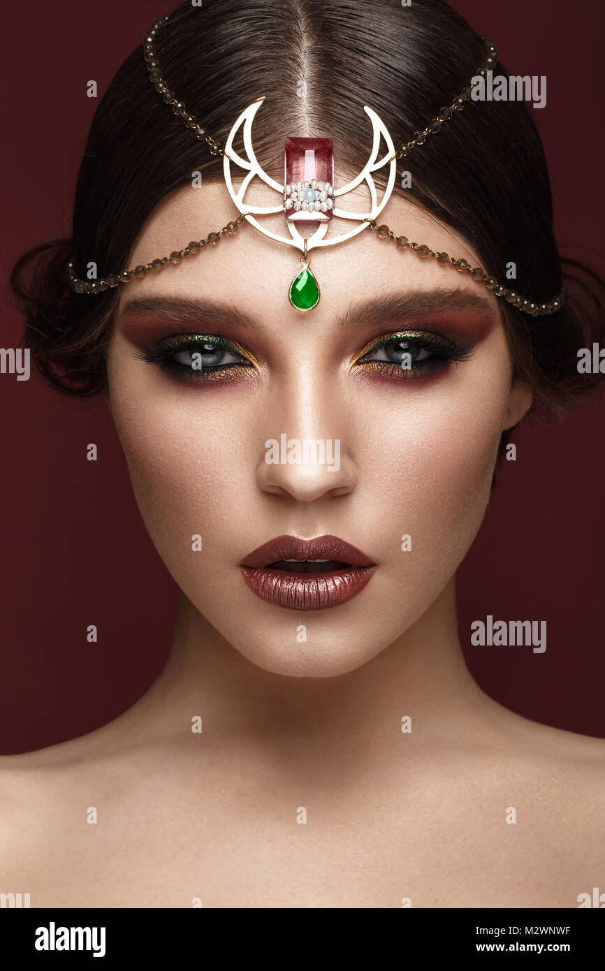 Beautiful girl with creative colorful makeup. Beauty face Stock Photo ...