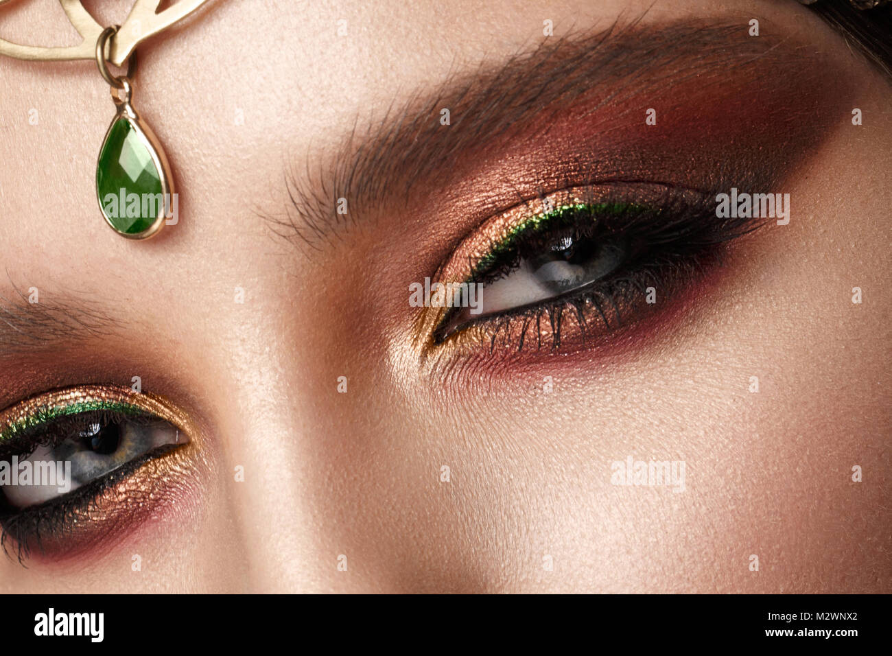 Beautiful girl with creative colorful makeup. Beauty face Stock Photo ...