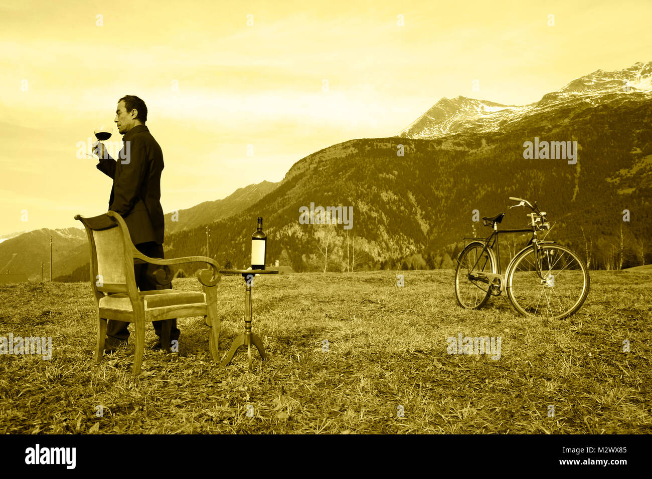 elegant man drinks wine in high altitude Stock Photo - Alamy