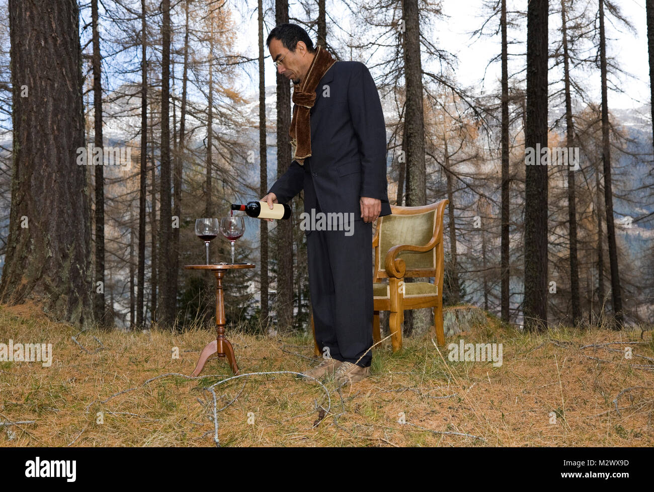 elegant man drinks wine in high altitude Stock Photo - Alamy