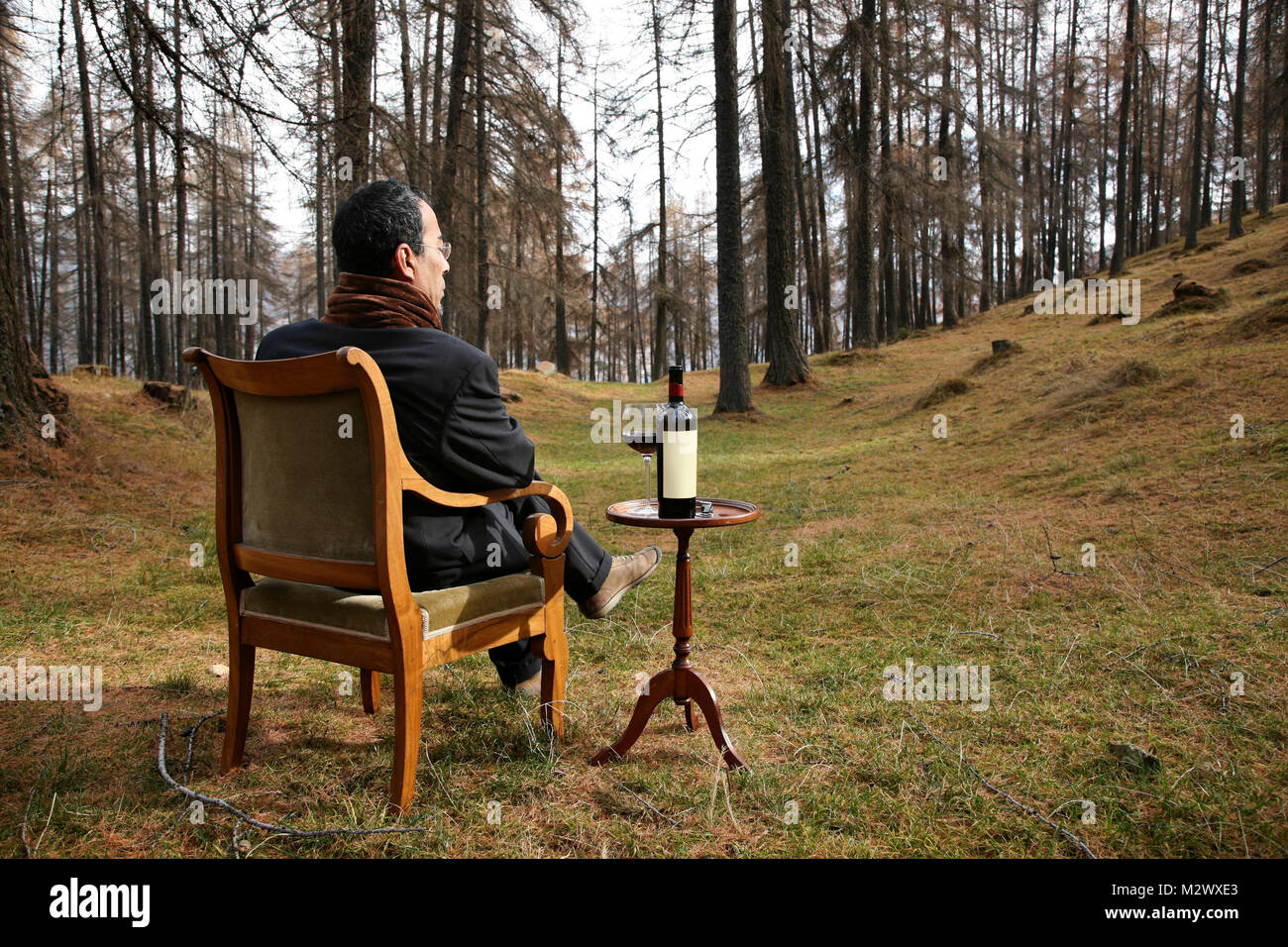 elegant man drinks wine in high altitude Stock Photo - Alamy