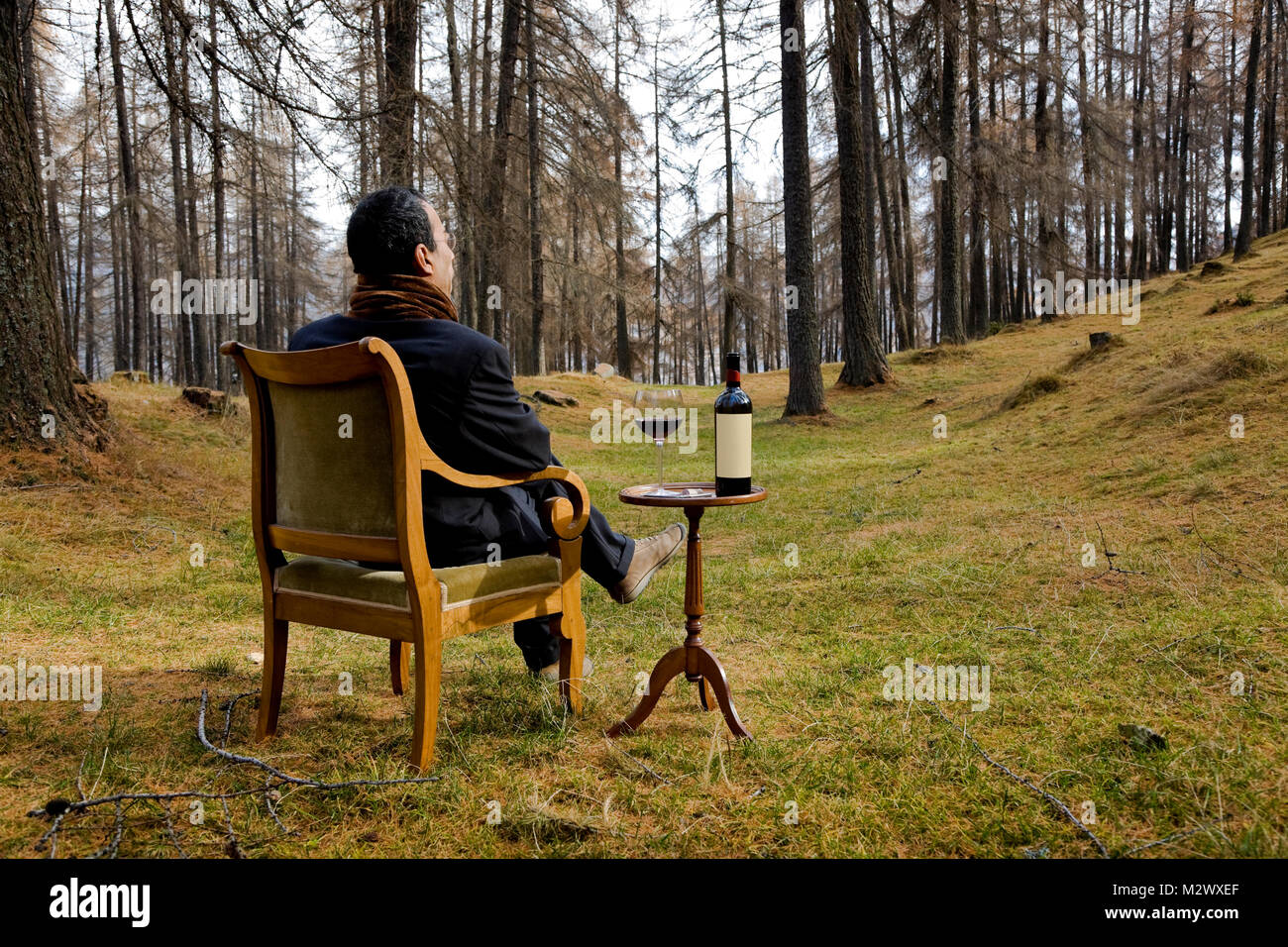 elegant man drinks wine in high altitude Stock Photo - Alamy