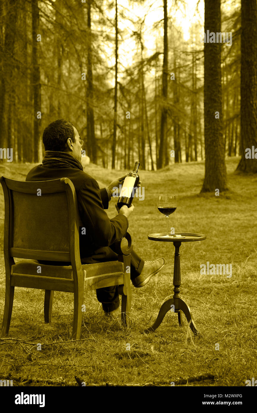 elegant man drinks wine in high altitude Stock Photo - Alamy