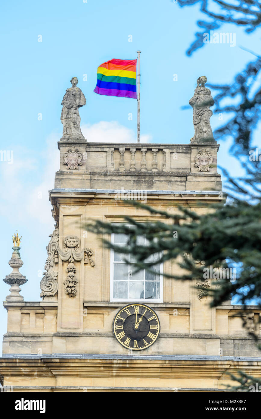 A rainbow lbgt (lbgtq) multi-coloured flag flutters in the wind aloft ...