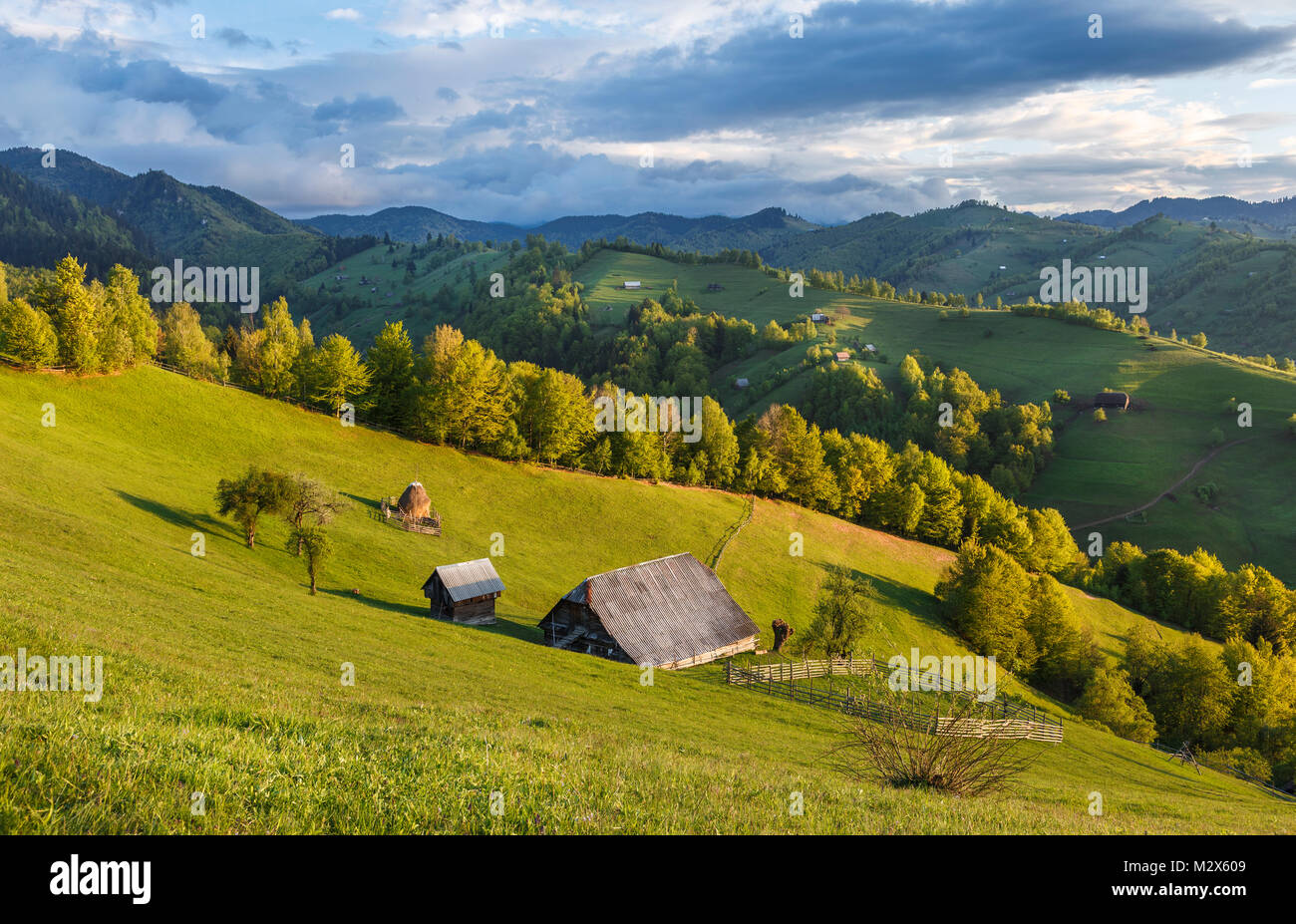 Mountain farm with old wooden house near Bran, Transylvania, Romania ...
