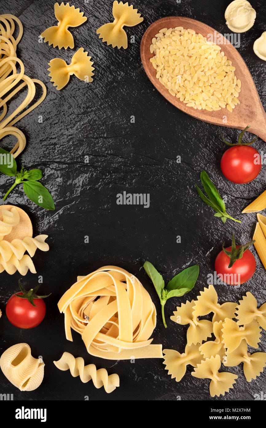 Overhead photo of different types of pasta on black Stock Photo - Alamy