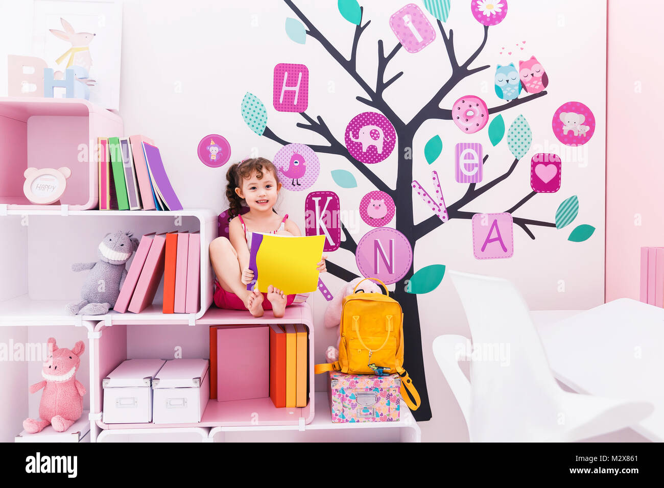 Cute girl in the study Stock Photo - Alamy