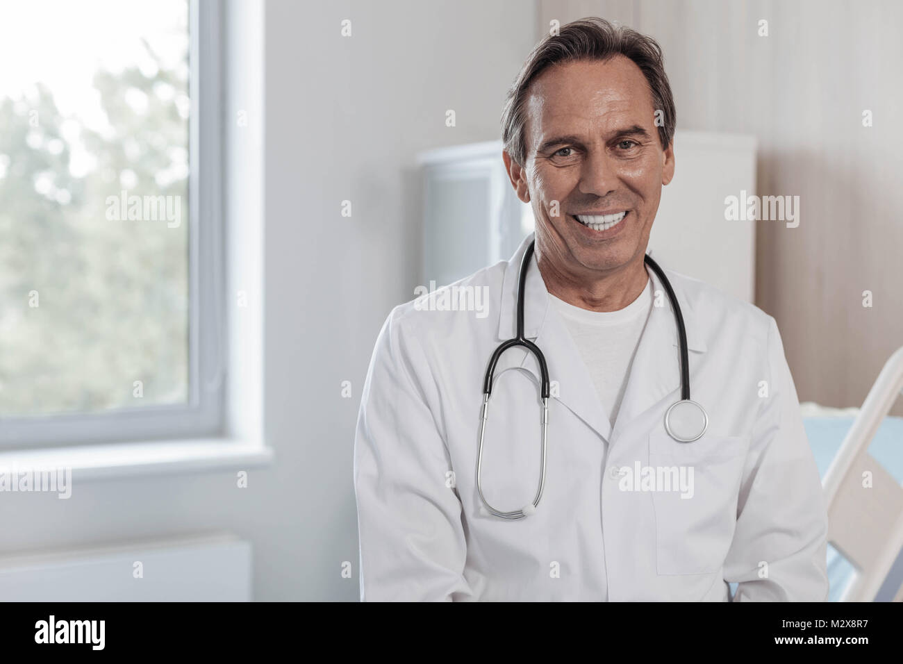 Grinning teeth man hi-res stock photography and images - Alamy