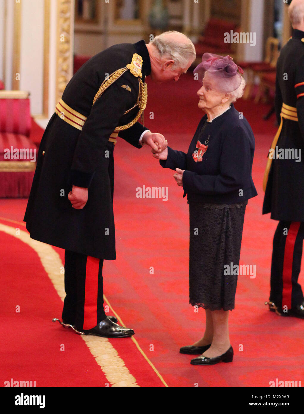 Made mbe by prince wales investiture ceremony buckingham palace hi-res ...