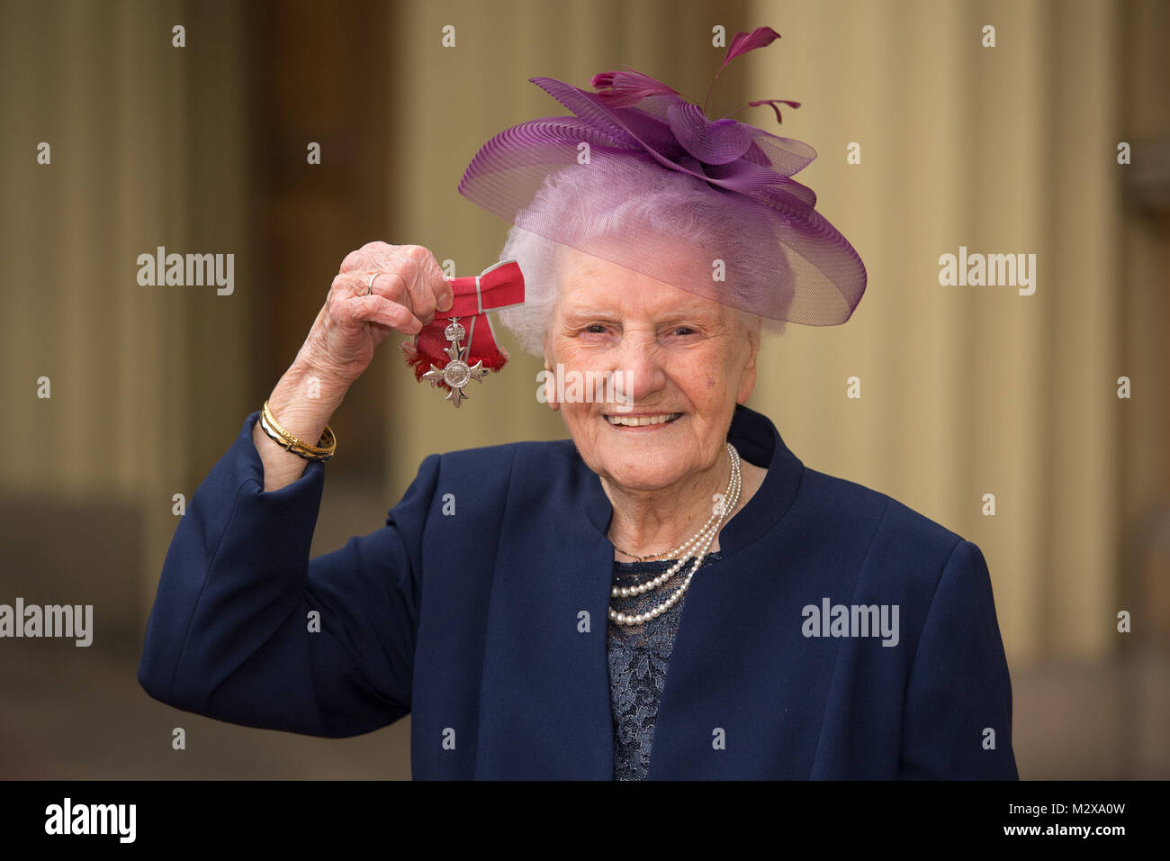 Majorie Maskrey with her MBE medal following an investiture ceremony at ...
