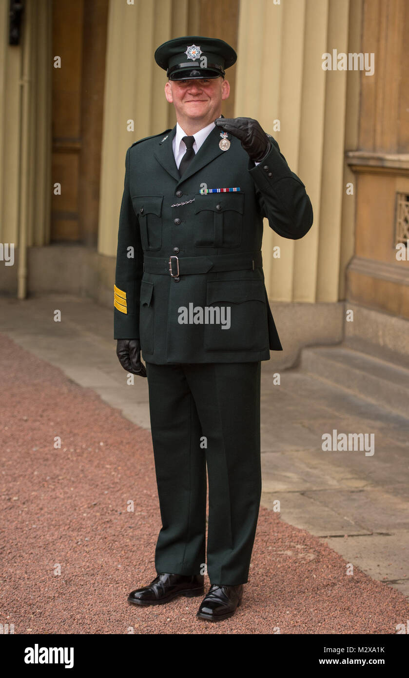 Police Service of Northern Ireland Sergeant Mark Wright with his Queen ...