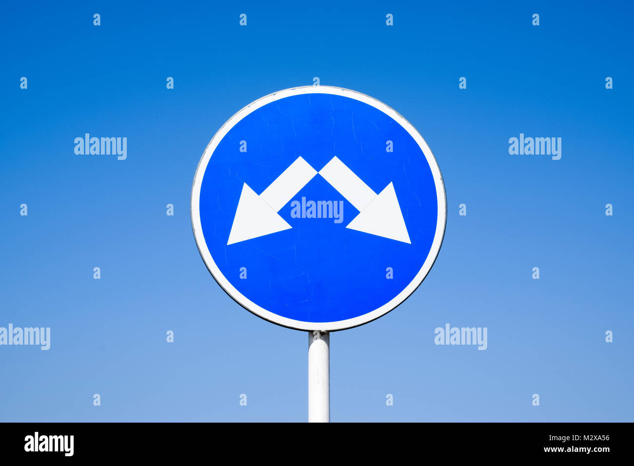 The sign of the crossing. Road signs. Sign on a blue background Stock ...