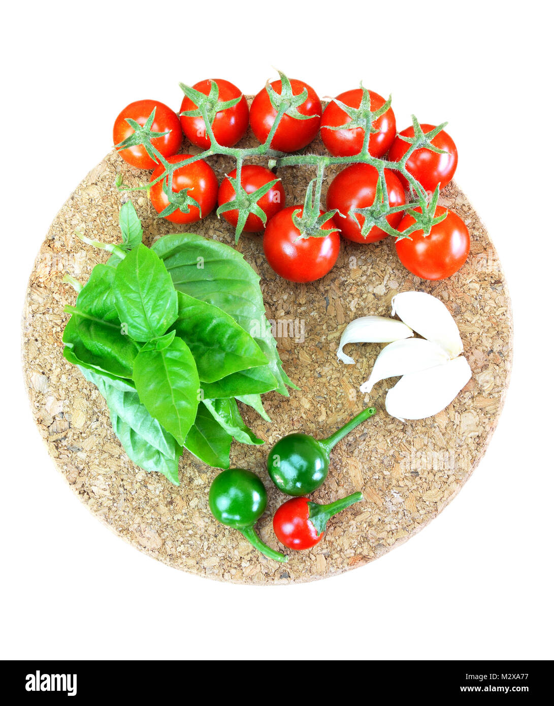 Tomatoes peppers on table Cut Out Stock Images & Pictures - Alamy