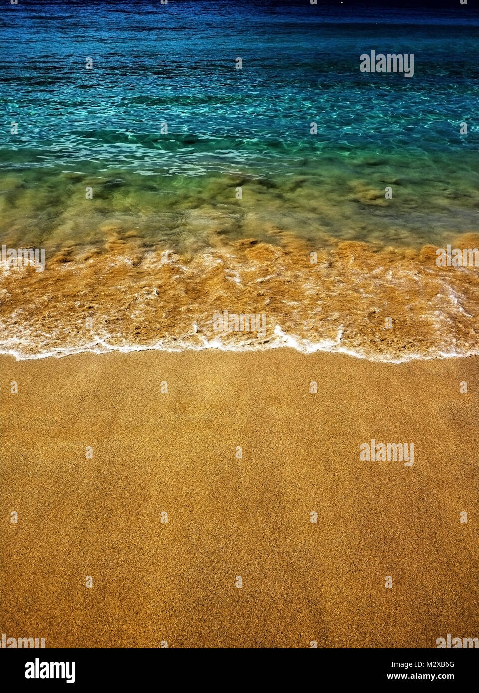 Wave washing across beach hi-res stock photography and images - Alamy