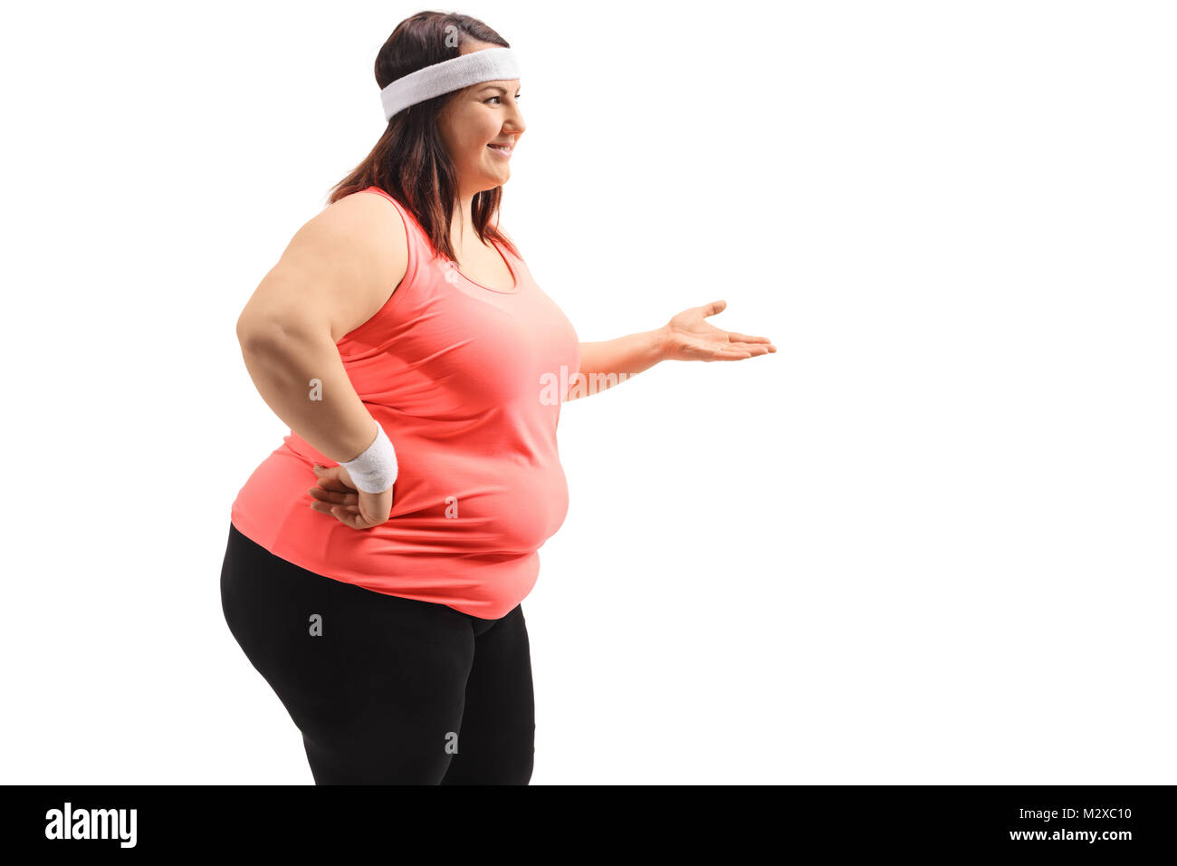 Profile shot of an overweight woman gesturing with her hand isolated on ...