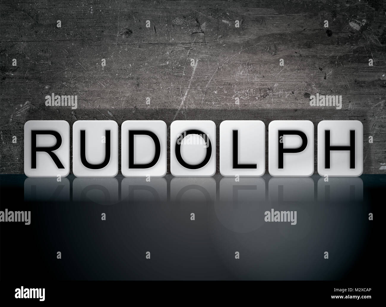 The word Rudolph concept and theme written in white tiles on a dark ...