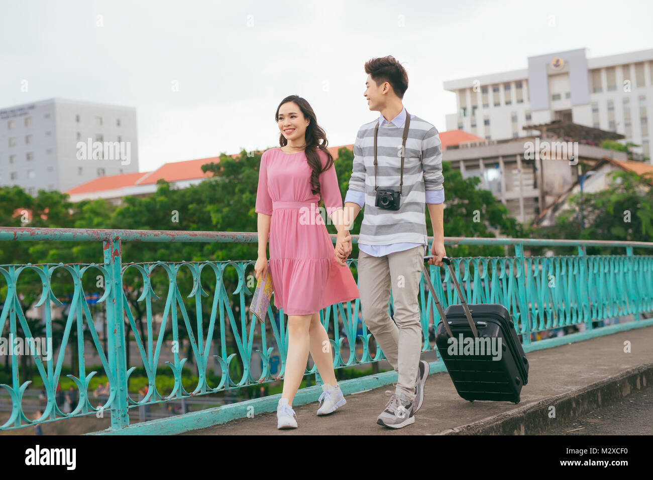 Young lovers walking around city on vacation, enjoying traveling ...