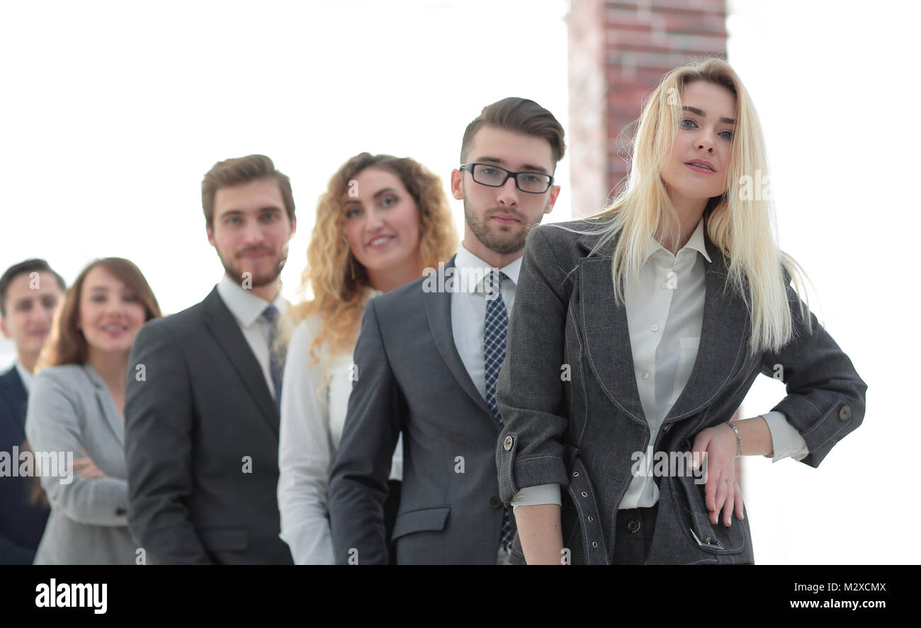 group of young business people standing in a row Stock Photo - Alamy